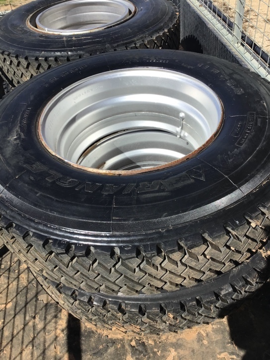 11R-22.5 Bandag Recap on rim | Farm Tender